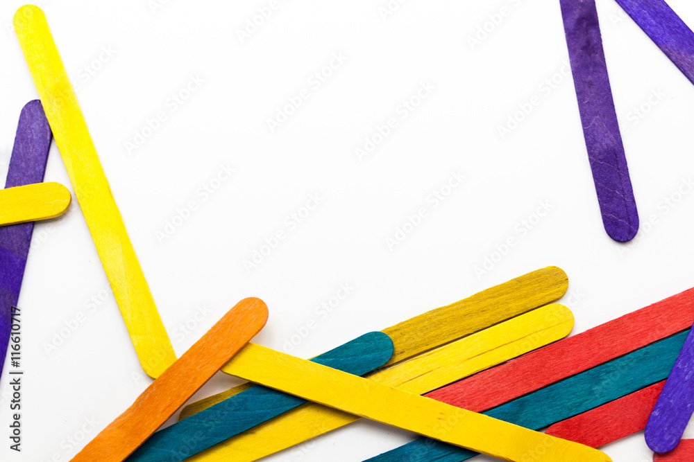 Colorful popsicle sticks over white background with copy space Stock ...