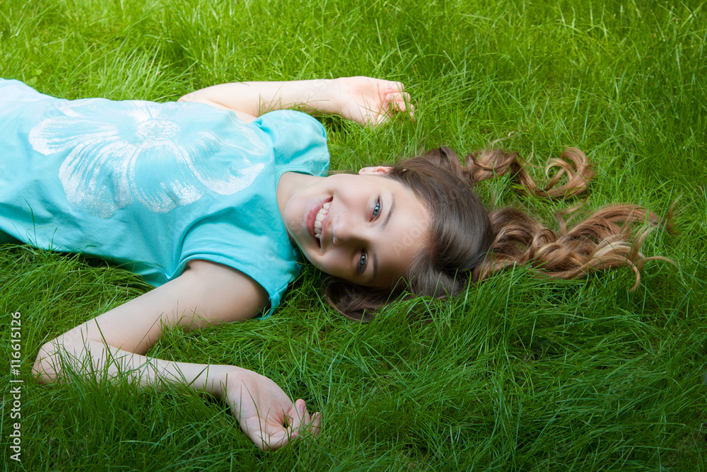 Pretty Teen Girl Lying On The Grass Laughter Joy Positive Human