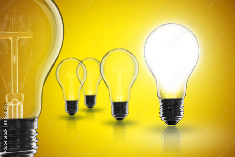 Idea concept - light bulb on the black background Stock Photo | Adobe Stock