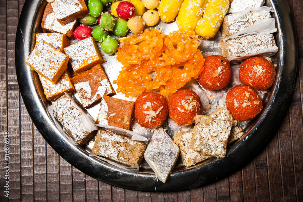 assorted delicious indian sweets Stock Photo | Adobe Stock
