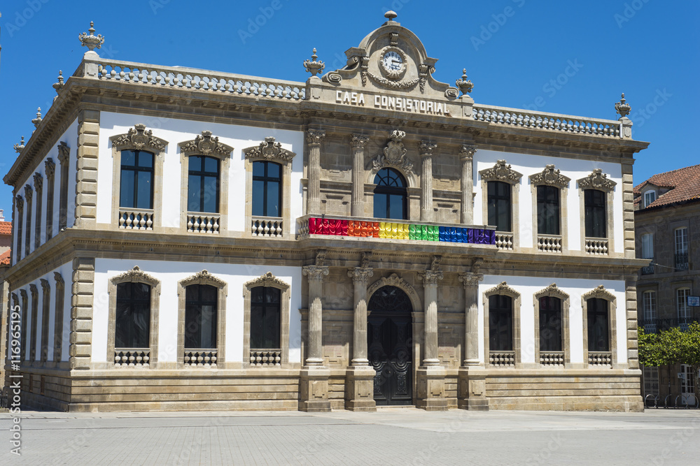 Building which houses the old city hall, with a rainbow flag of gay ...