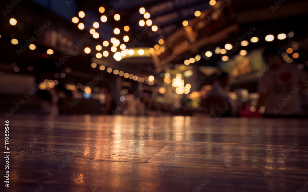 Empty wood table top on blur cafe restaurant in dark background Stock ...