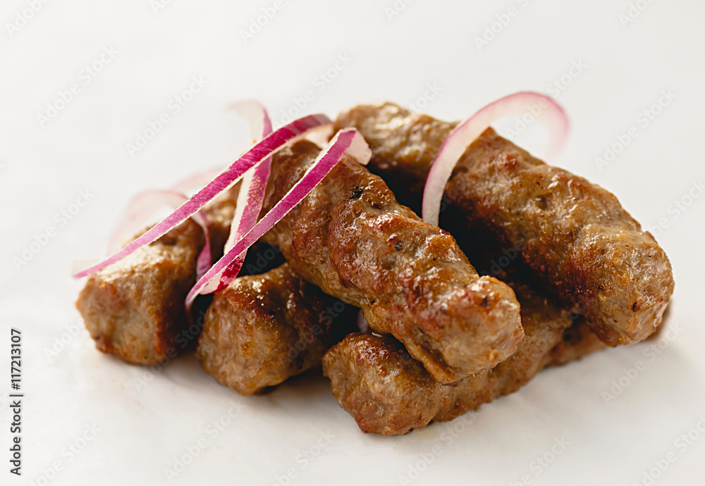 Chevapchichi isolated on white Stock-Foto | Adobe Stock