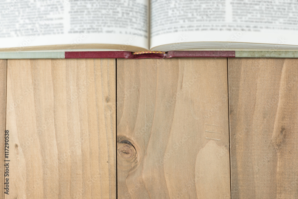 opening book on wood plank texture background,top view, flat lay, copy ...