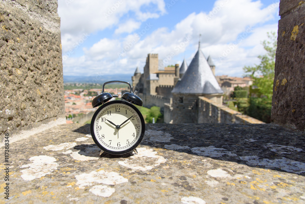 Alarm clock and the castle Stock-Foto | Adobe Stock