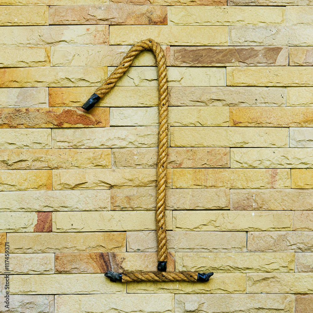Rope Number one Alphabet on stone background Stock Photo | Adobe Stock
