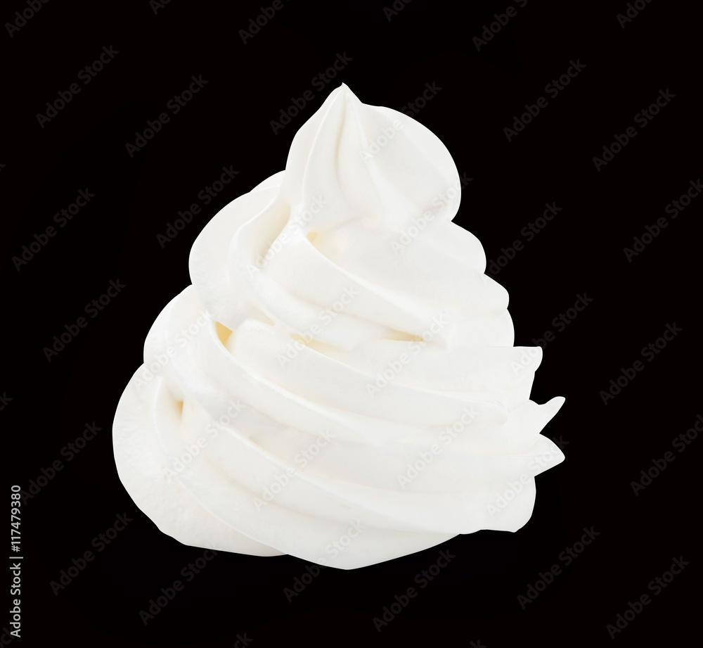 Whipped cream isolated on a black background with clipping path. Front ...