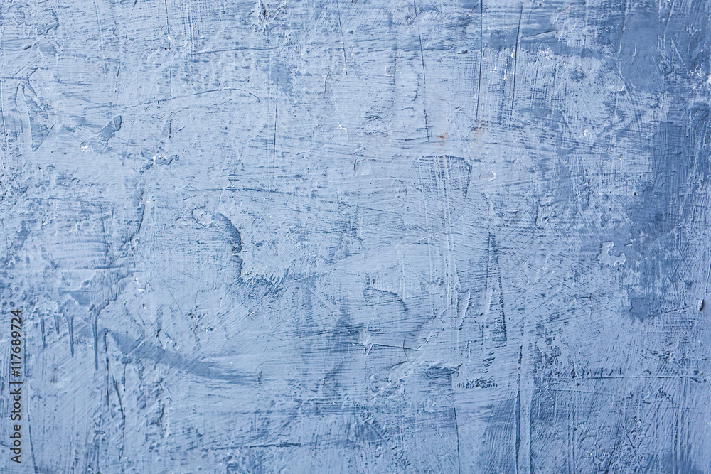 closeup of a blue colored plastered wall. Stock Photo | Adobe Stock