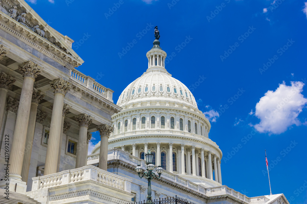 US Capitol Building on a clear day with blue sky. Senate and House of ...