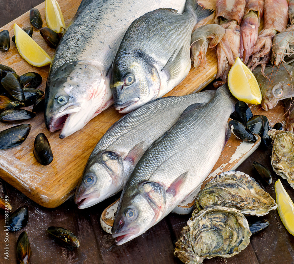 Seafood with fresh herbs. Stock-Foto | Adobe Stock