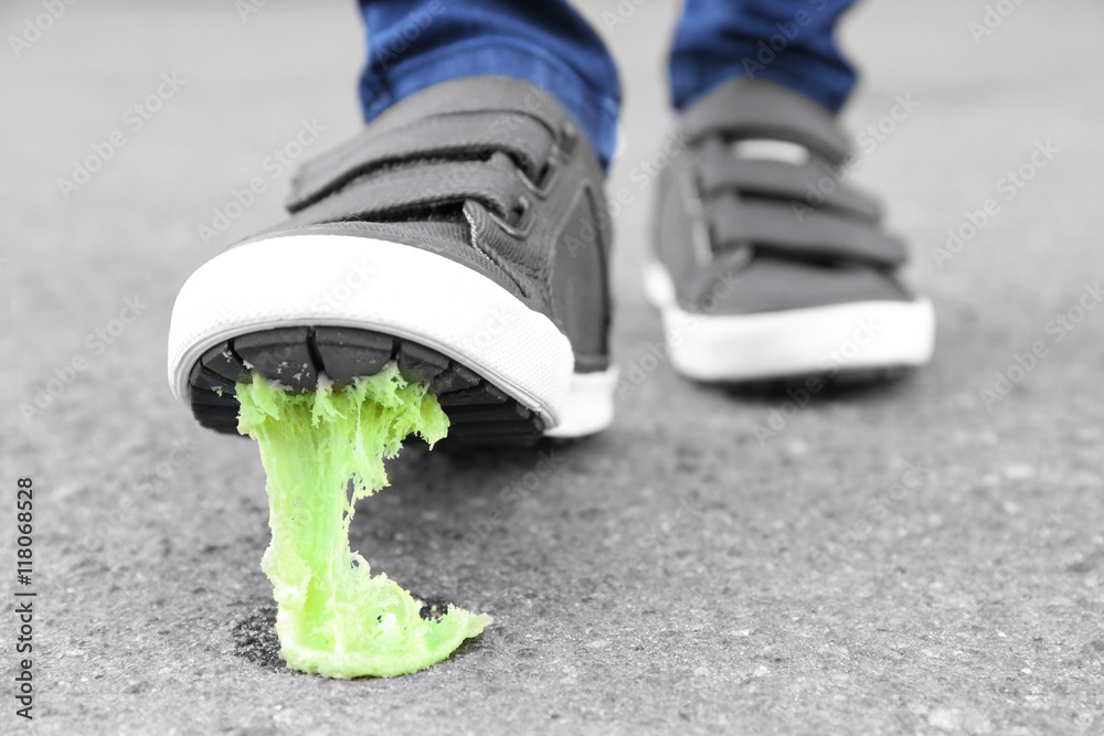 Foot stuck into chewing gum on street Stock Photo | Adobe Stock