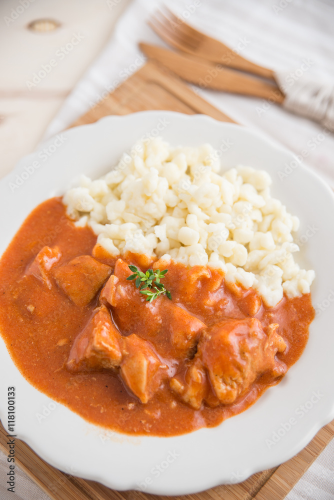 Gulasch mit Nockerl Stock-Foto | Adobe Stock