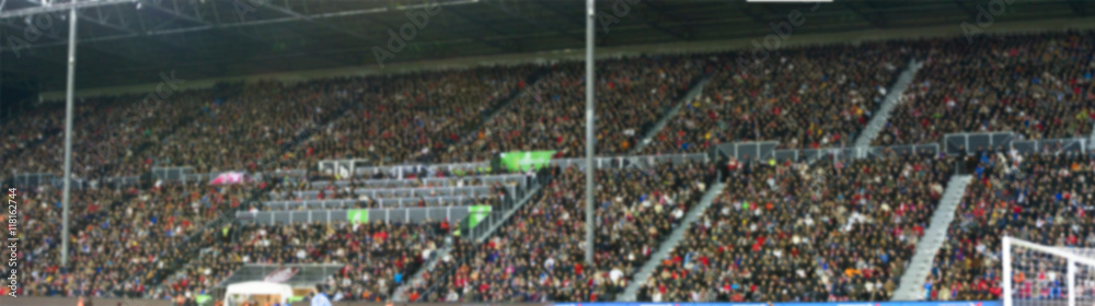 Blurred crowd in the football stadium Stock Photo | Adobe Stock