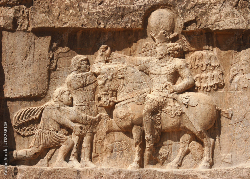 Ancient relief of the necropolis Naqsh-e Rustam that shows the triumph ...