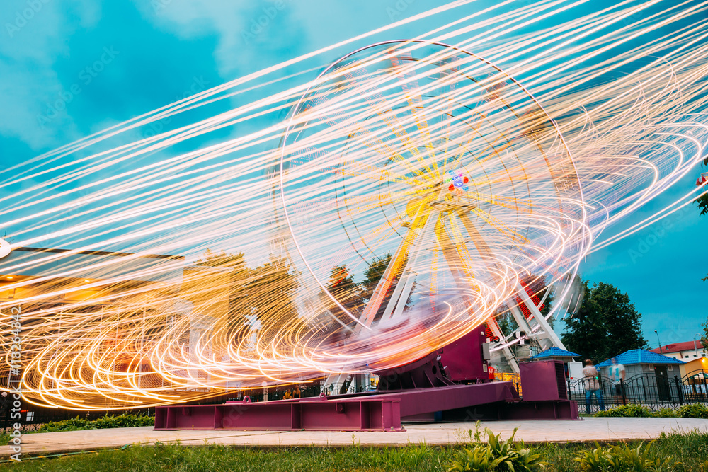 Motion Blurred Of High Speed Rotating Attraction Amusement Park. Stock ...