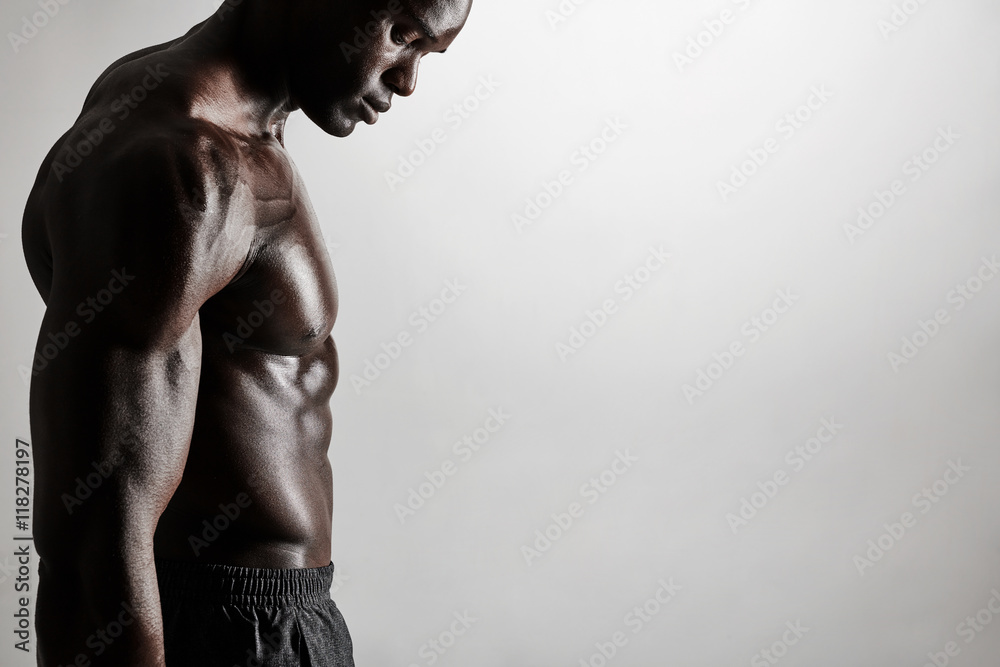 Foto de Torso of a muscular man with copyspace do Stock | Adobe Stock