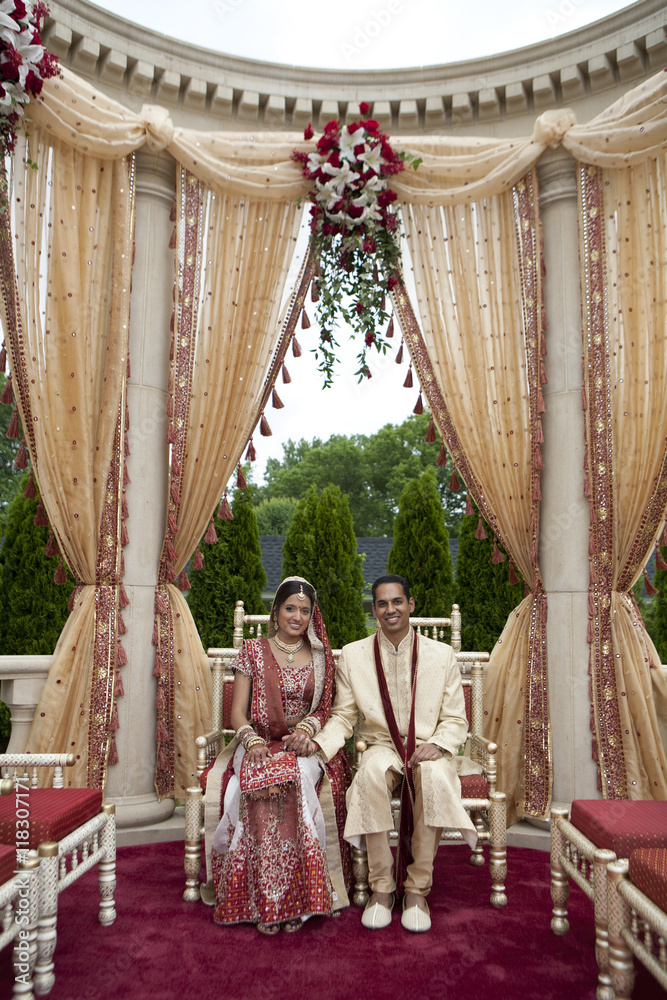 Indian bride and groom in traditional clothing Stock Photo | Adobe Stock