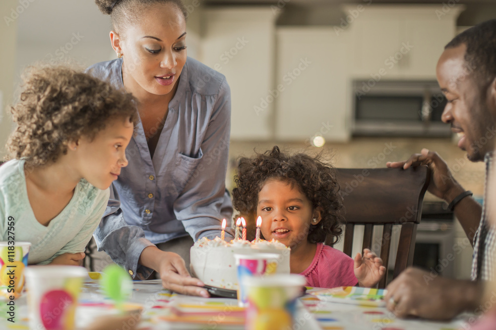 Family together celebrating birthday party Stock Photo | Adobe Stock