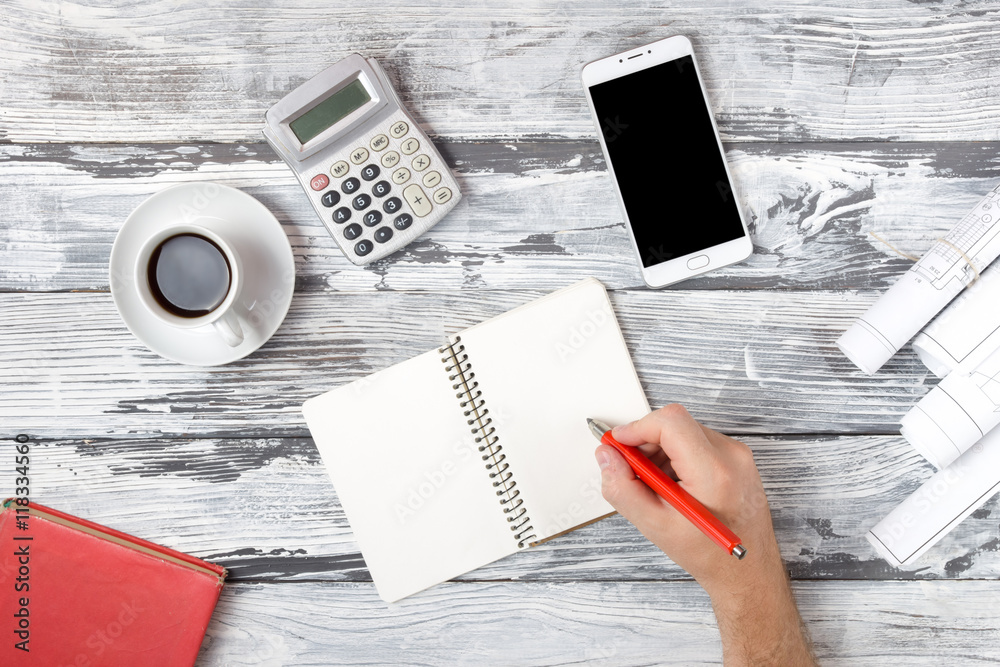 Office table desk with set of colorful supplies, white blank note pad ...