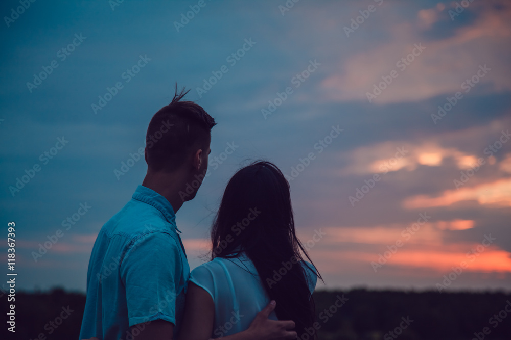 Love story. In love couple walking on sunset background. Happy end ...
