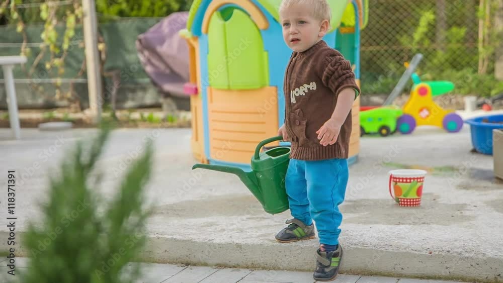 A little boy starts crying when he can't step on the lower stair. He is ...