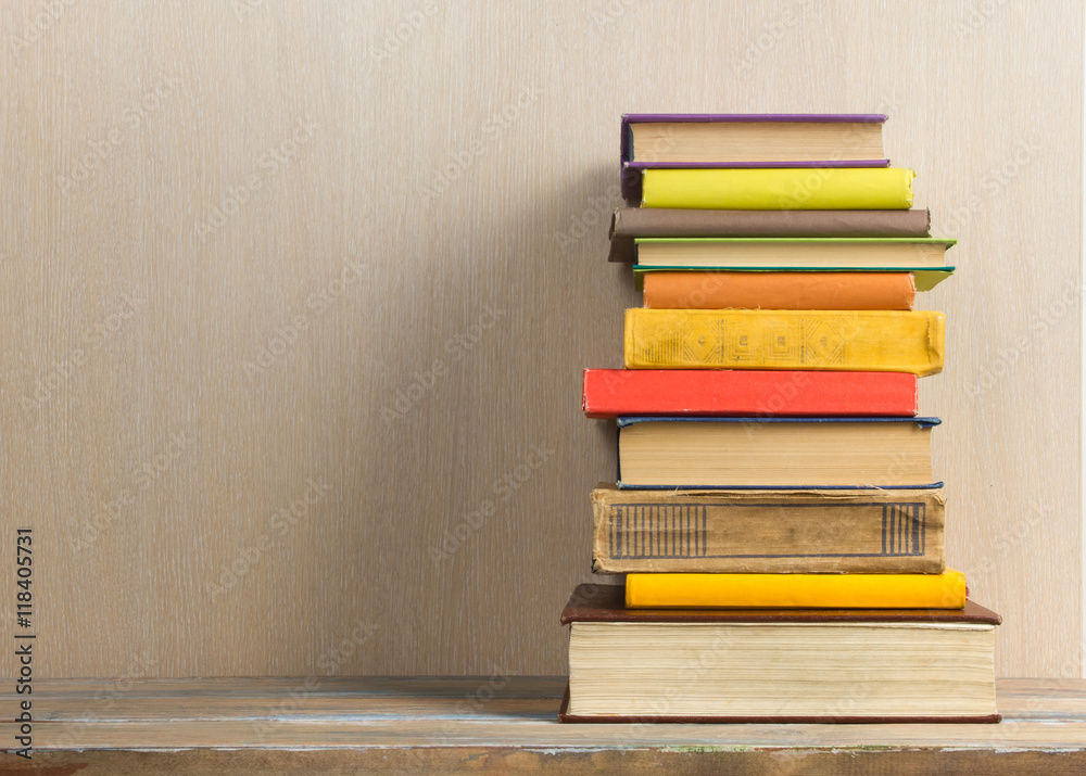 Books on grunge wooden table desk shelf in library. Back to school ...