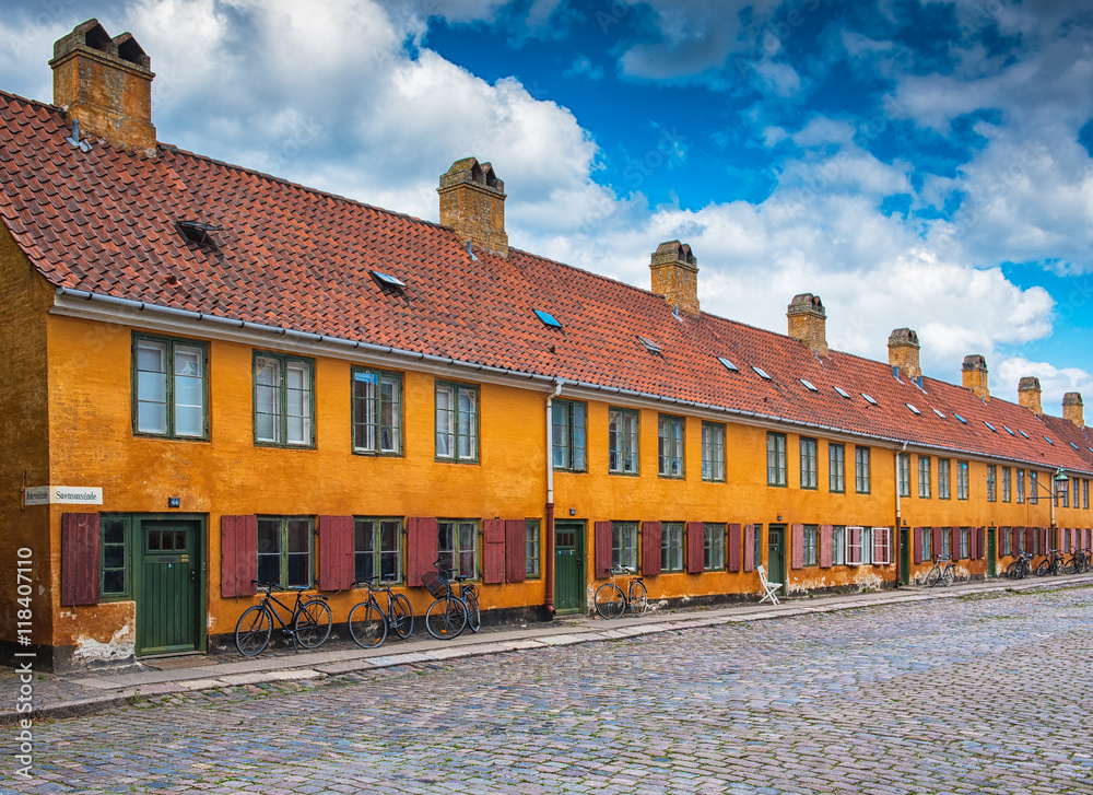 Nice old yellow houses of Nyboder, medieval district of Copenhagen ...