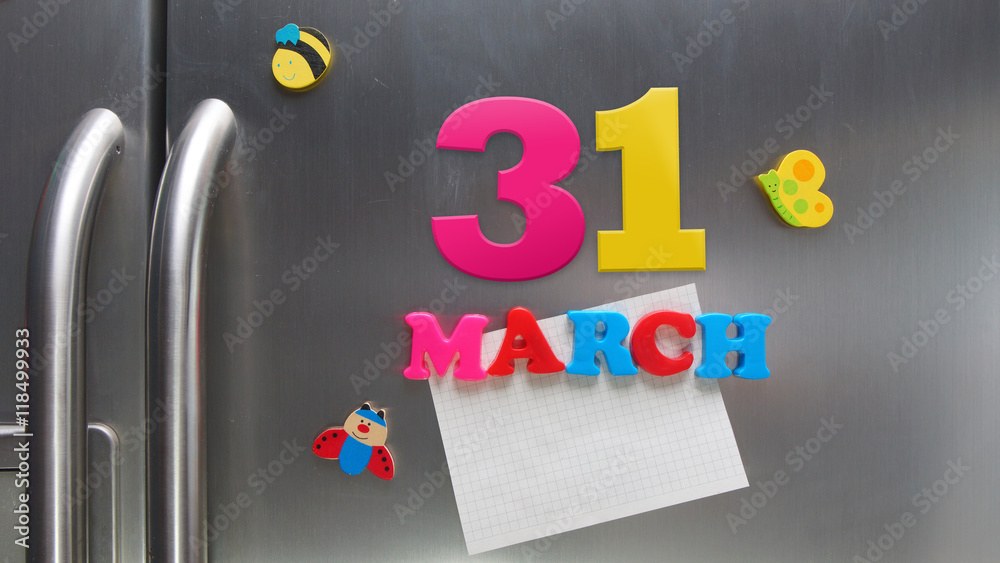 March 31 calendar date made with plastic magnetic letters holding a ...