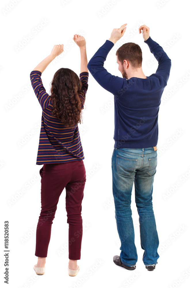 Back view of dancing young couple(men and women). Dance party. girls ...