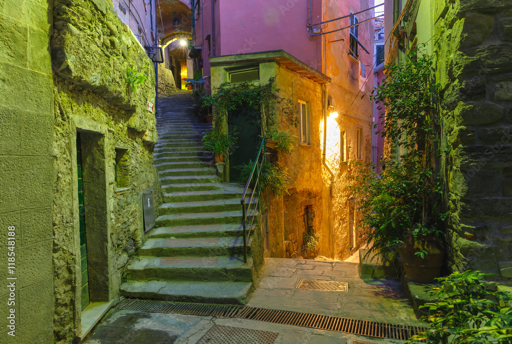 Narrow dark alley and stairway in the old town - typical Italian ...