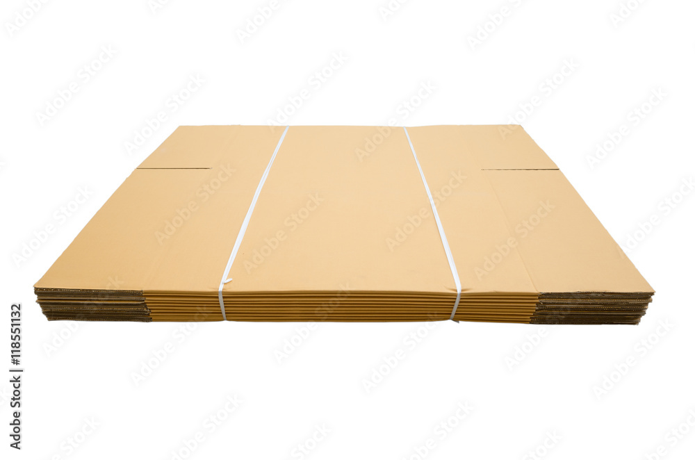 Stack of large corrugated cardboard box tied with nylon isolated on ...