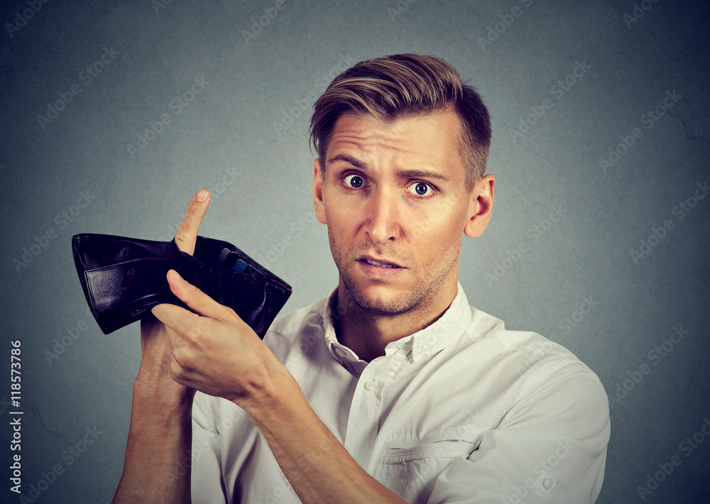 Man with no money. Businessman holding empty wallet Stock-Foto | Adobe ...