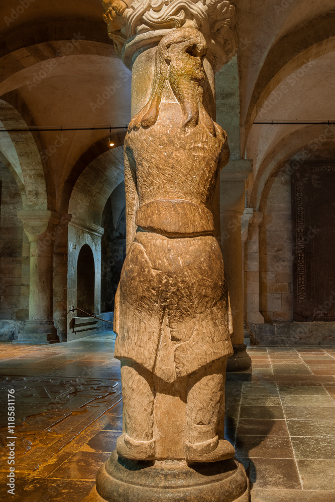 Finn the Giant. Stone statue at a pillar in the crypt of Lund cathedral ...