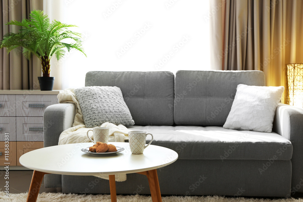 Living room design interior with sofa and round table Stock Photo ...