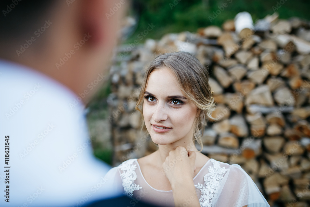 Lady with deep hazel eyes admires her man standing before the wo Stock ...
