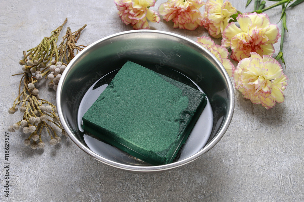 Florist at work: how to make box with flowers, step by step, tut Stock ...