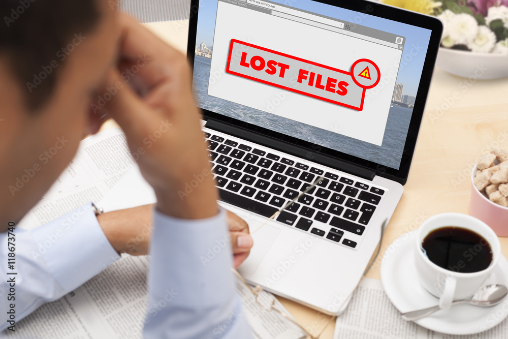 Stressed businessman has just lost his important files Stock Photo ...