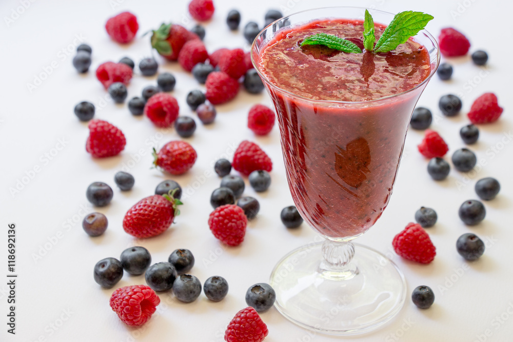 Strawberry raspberry blueberry smoothies. Stock Photo | Adobe Stock