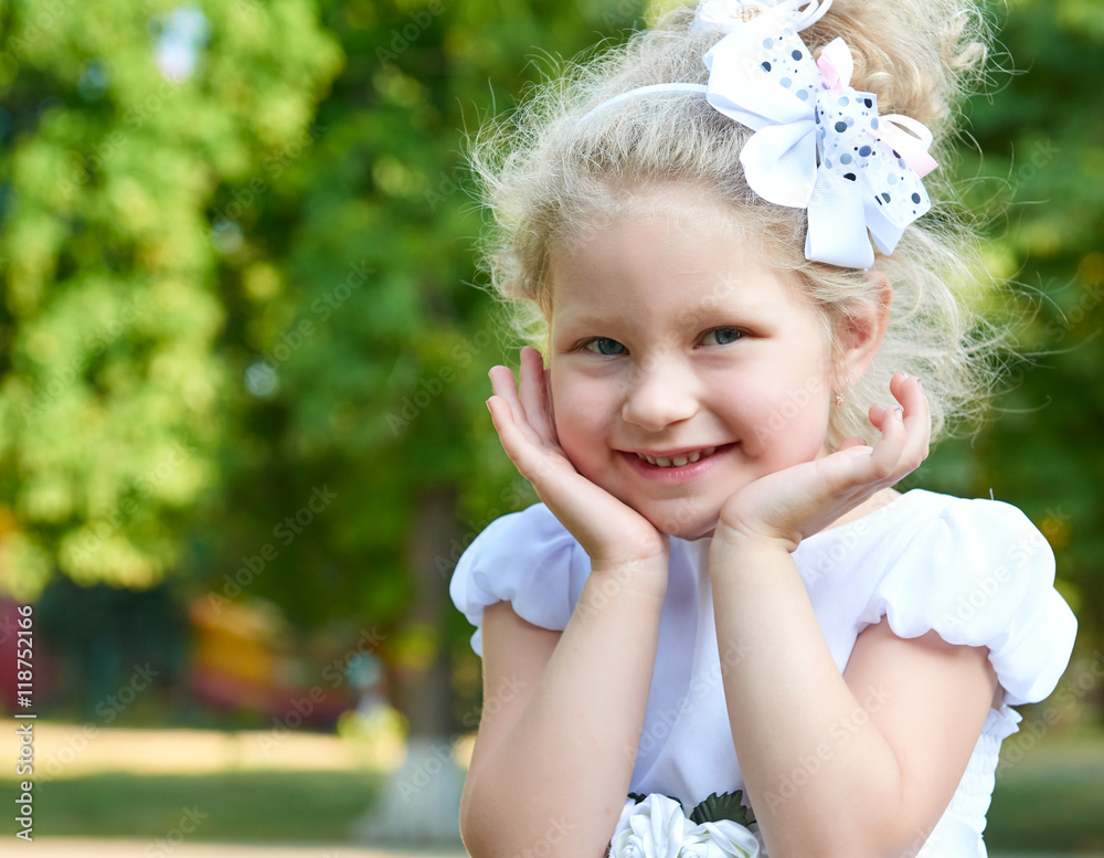 child girl portrait touch face closeup, posing in white gown, happy ...