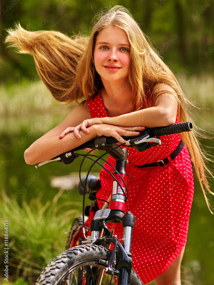 Bicycle Girl Girl Wearing Sundress Rides Bicycle Into Park Girl In