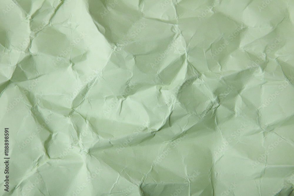 A full page of scrunched up pastel green wrapping paper texture Stock ...