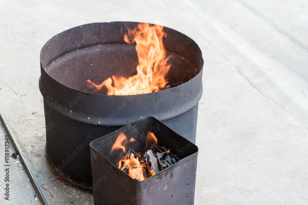 Joss Paper burn in the bucket. Chinese tradition for passed away ...