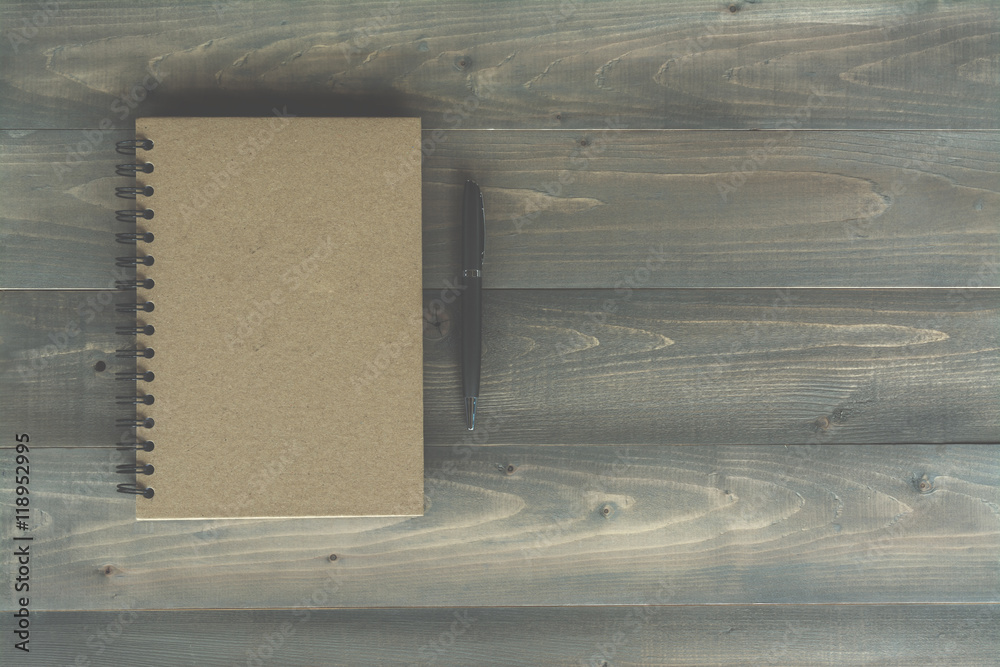 notebook and pen on wooden background Stock Photo | Adobe Stock