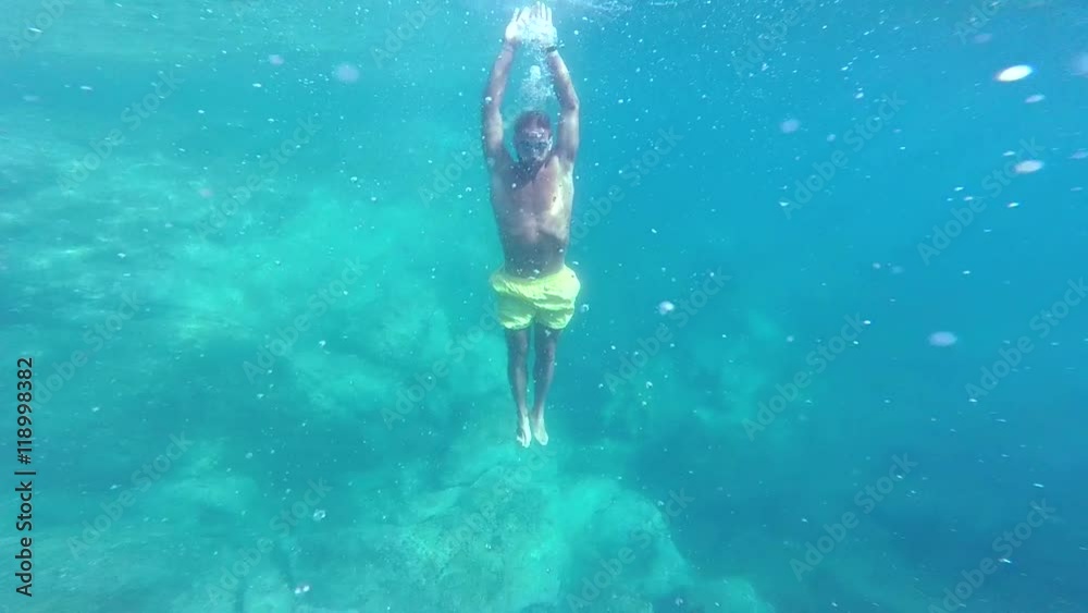 A boy going under water Stock Video | Adobe Stock