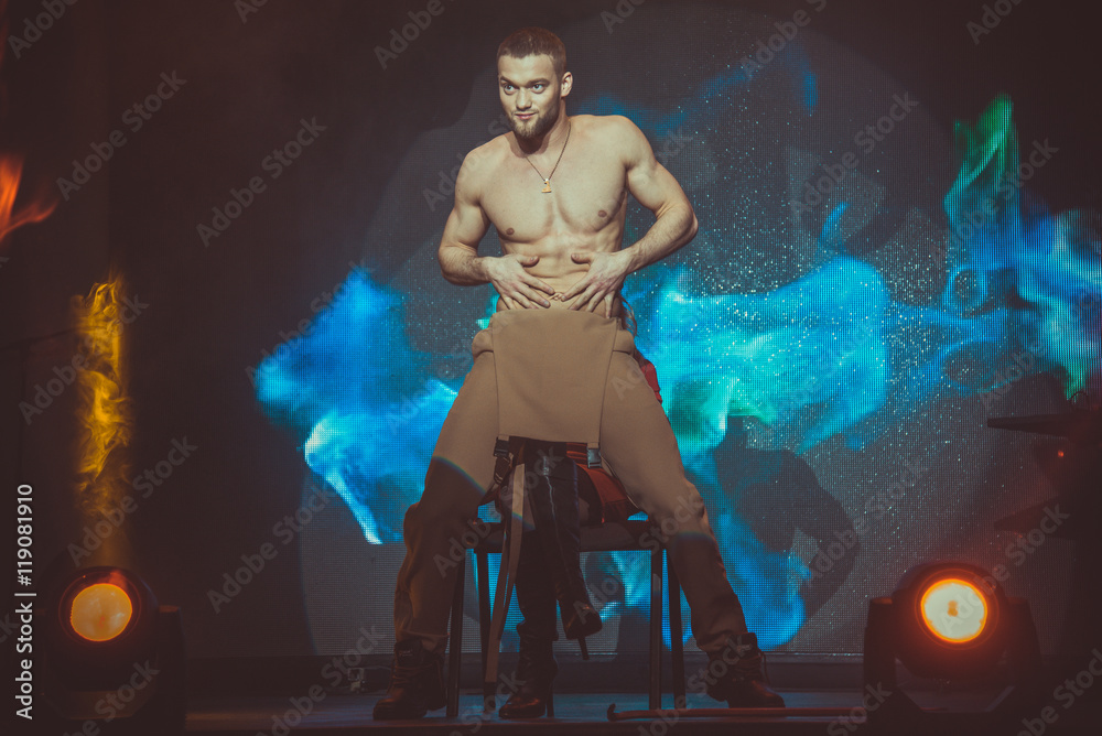 Strippers. Man dancing at a strip in the builder costume. Stock Photo ...