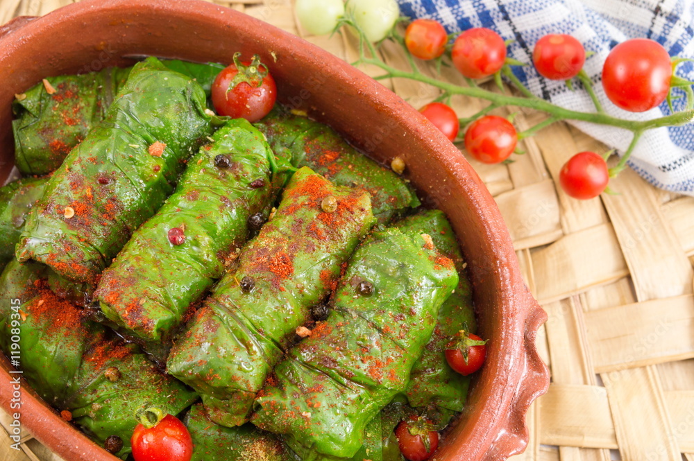 Sarma rolls in a traditional plate and cherry tomato Stock-Foto | Adobe ...