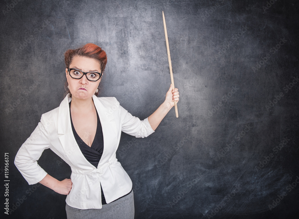 Angry teacher with pointer Stock Photo | Adobe Stock
