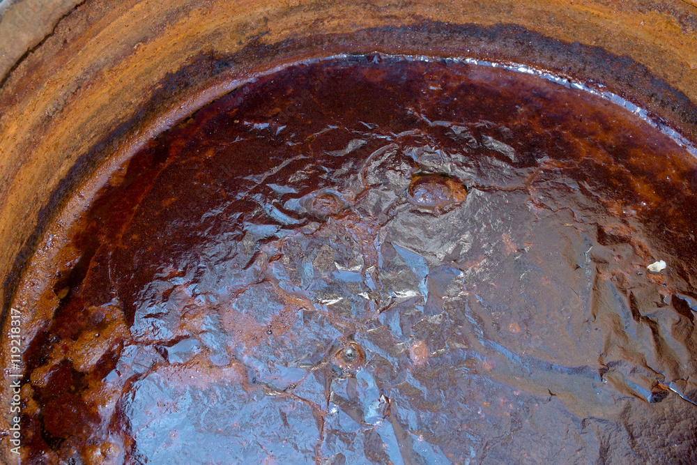 Rusty polluted water by oxidation with metal.Iron oxides stain the ...
