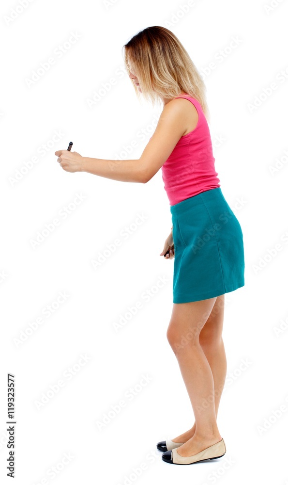 back view of writing beautiful woman. Young girl in dress. Isolated ...