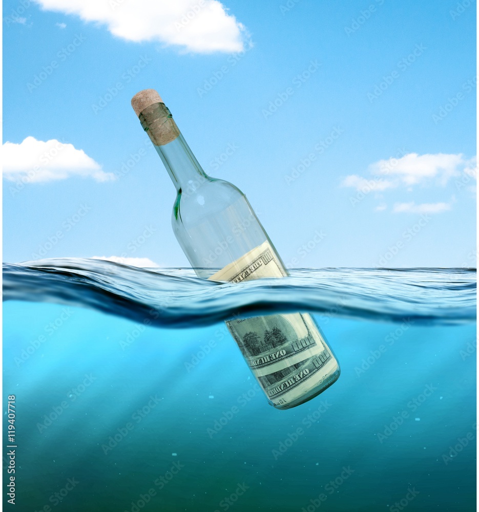 Concept "financial assistance". Bottle of money floating in the water ...